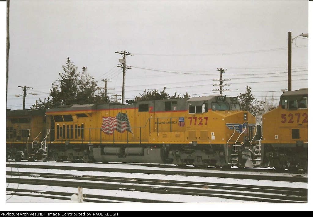 UP 7727 rolls east behind UP 7752.